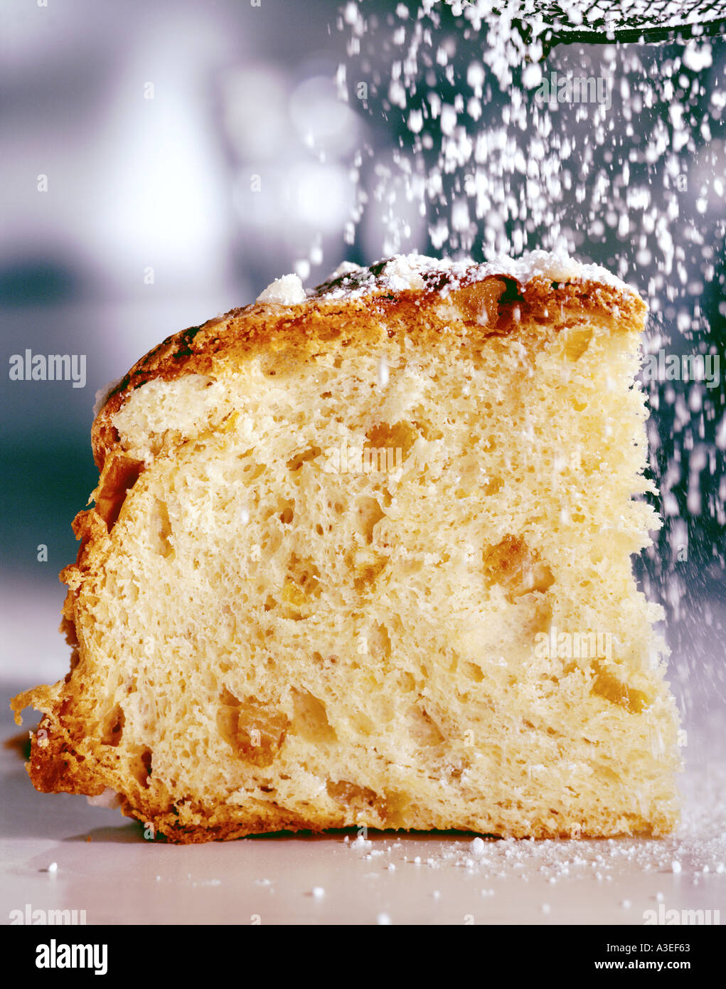CAKE Italian Panetone cake with falling icing sugar Stock Photo - Alamy