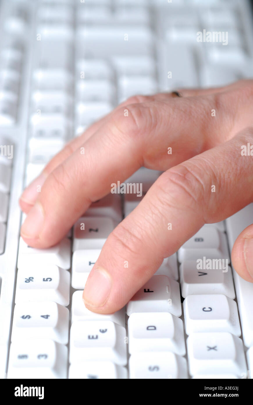 Hand on computer keyboard Stock Photo - Alamy