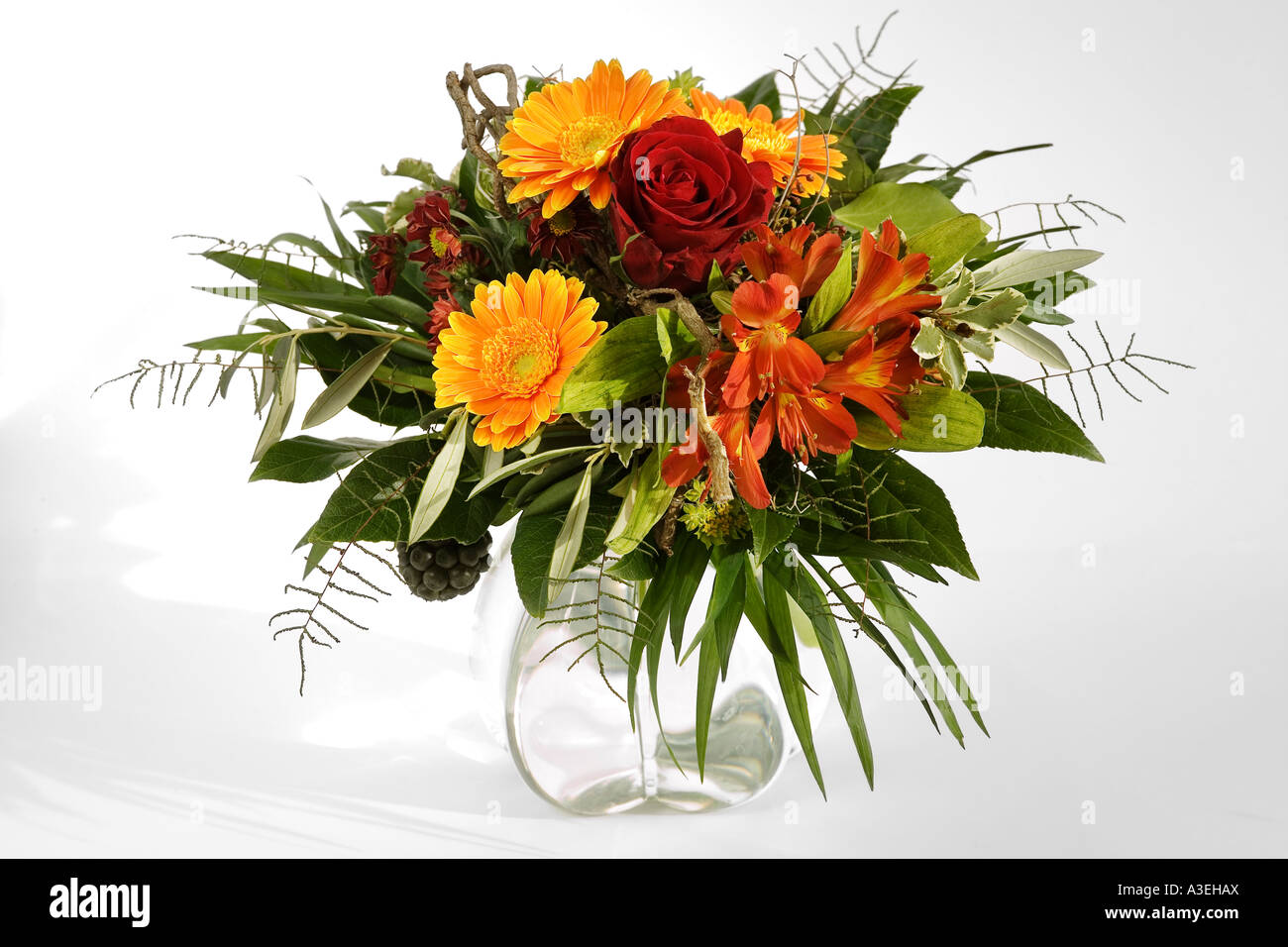 Flowers bouquet in a glass vase Stock Photo - Alamy