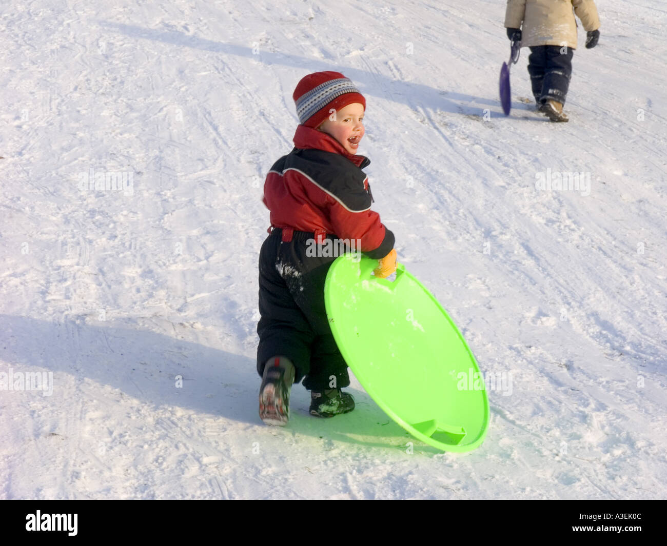 Boy Sliding On Ice