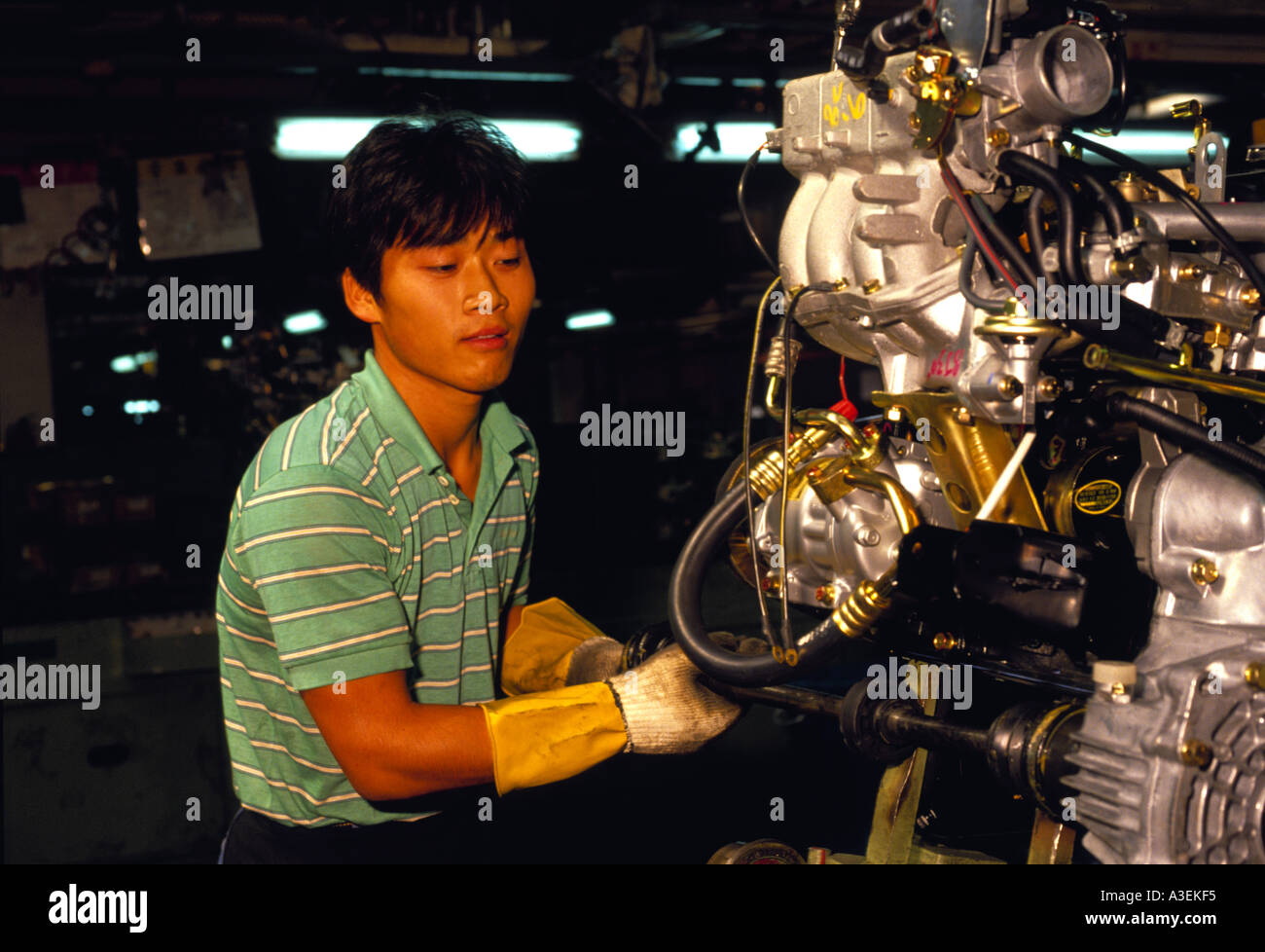 Production line of car factory assembling line with worker partly ...