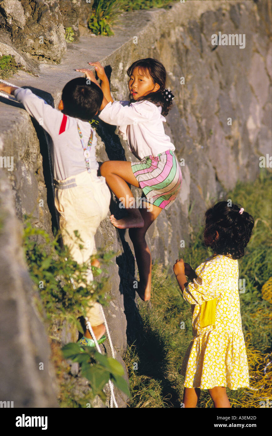 Korean children climbing playing Cheju do island south Korea Stock ...