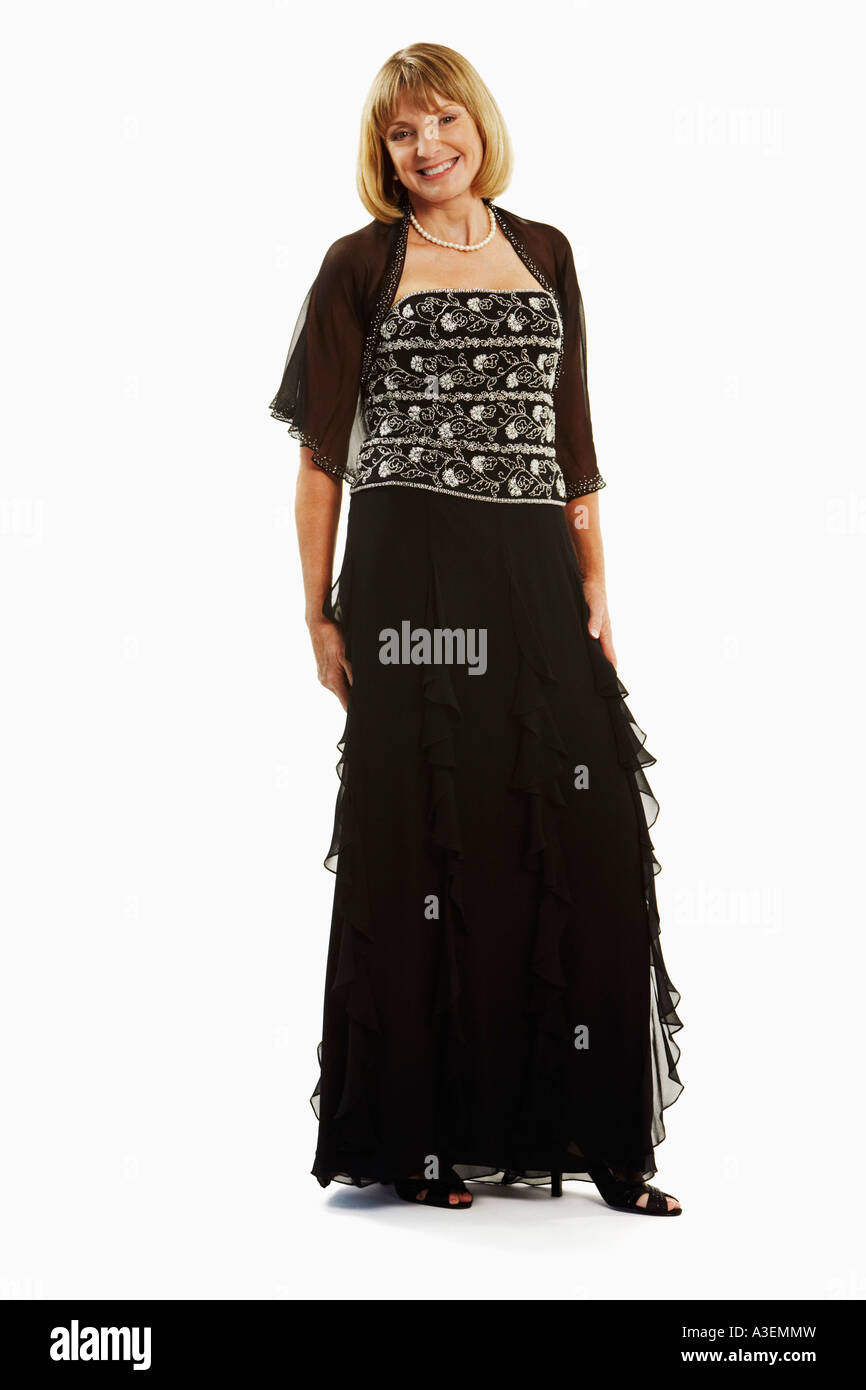 Happy senior woman standing Cut Out Stock Images & Pictures - Alamy
