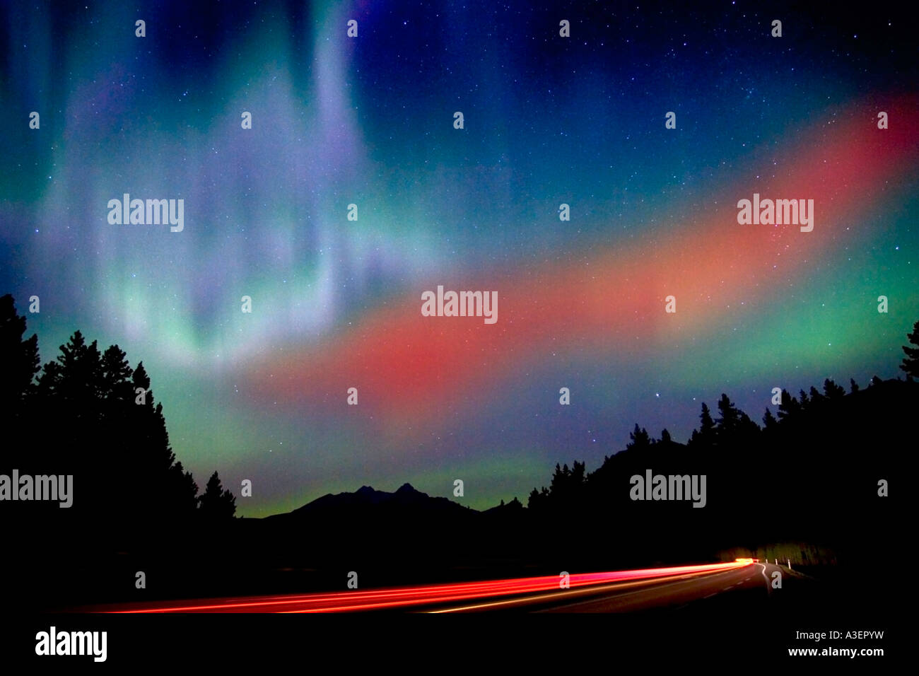 Light trails at night with fog and stars hi-res stock photography and ...