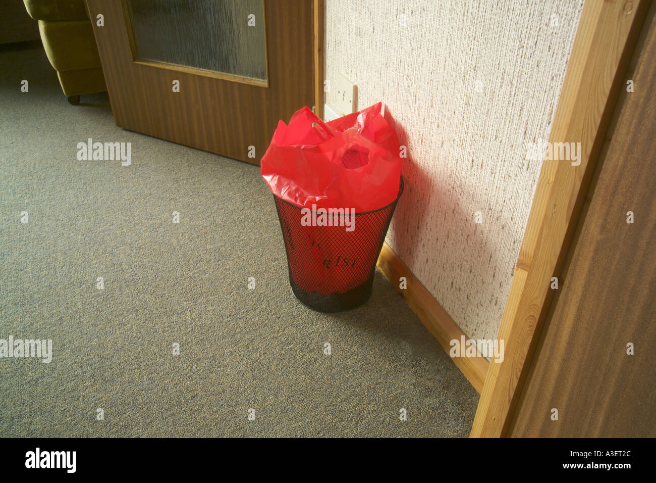 Interior of 1970 s style house brown red rubbish bin Stock Photo - Alamy