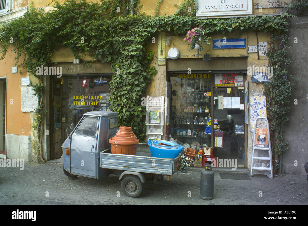 Rome Italy Europe The Eternal City old hardware shop with Ape van ...