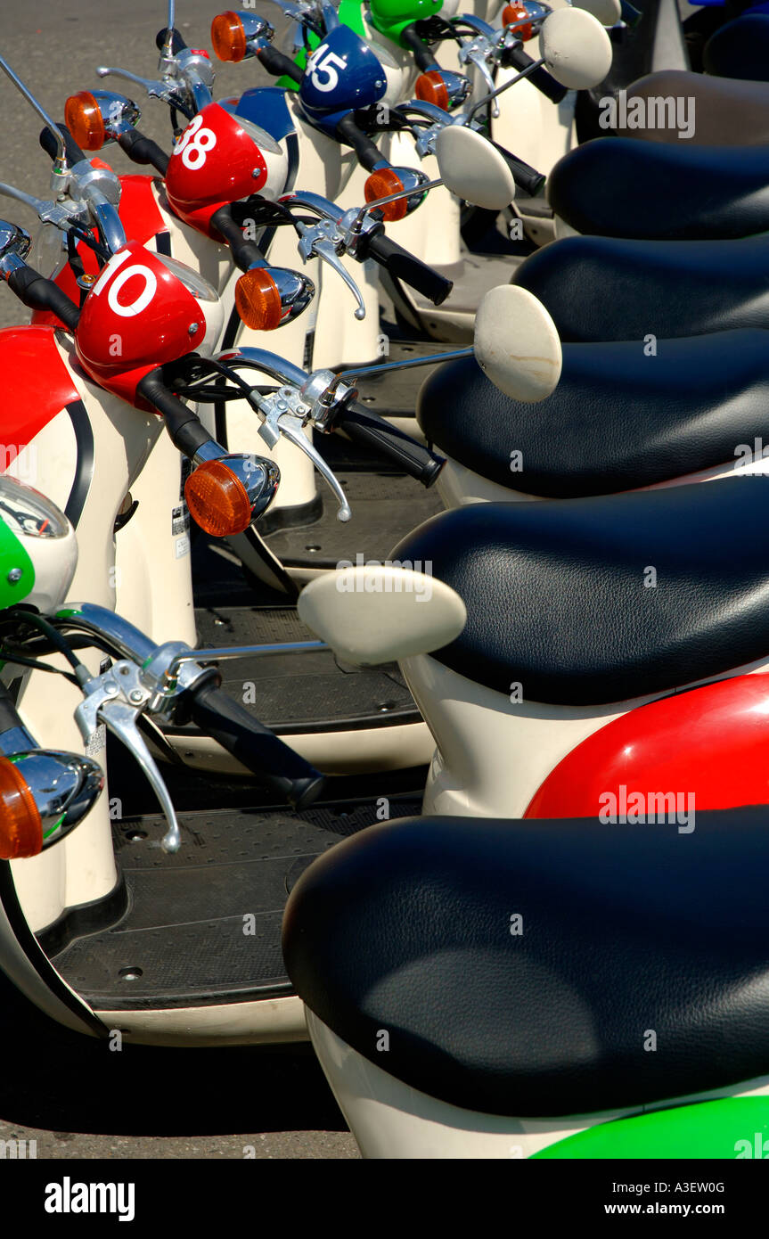 Scooters in a row Stock Photo - Alamy