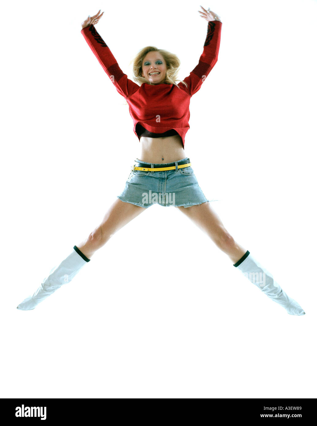 blond girl jumping star shape Stock Photo - Alamy