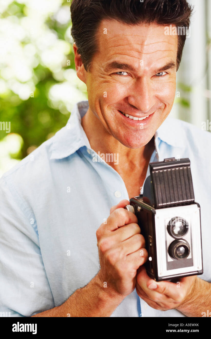 Creative old man smiling camera hi-res stock photography and images - Alamy