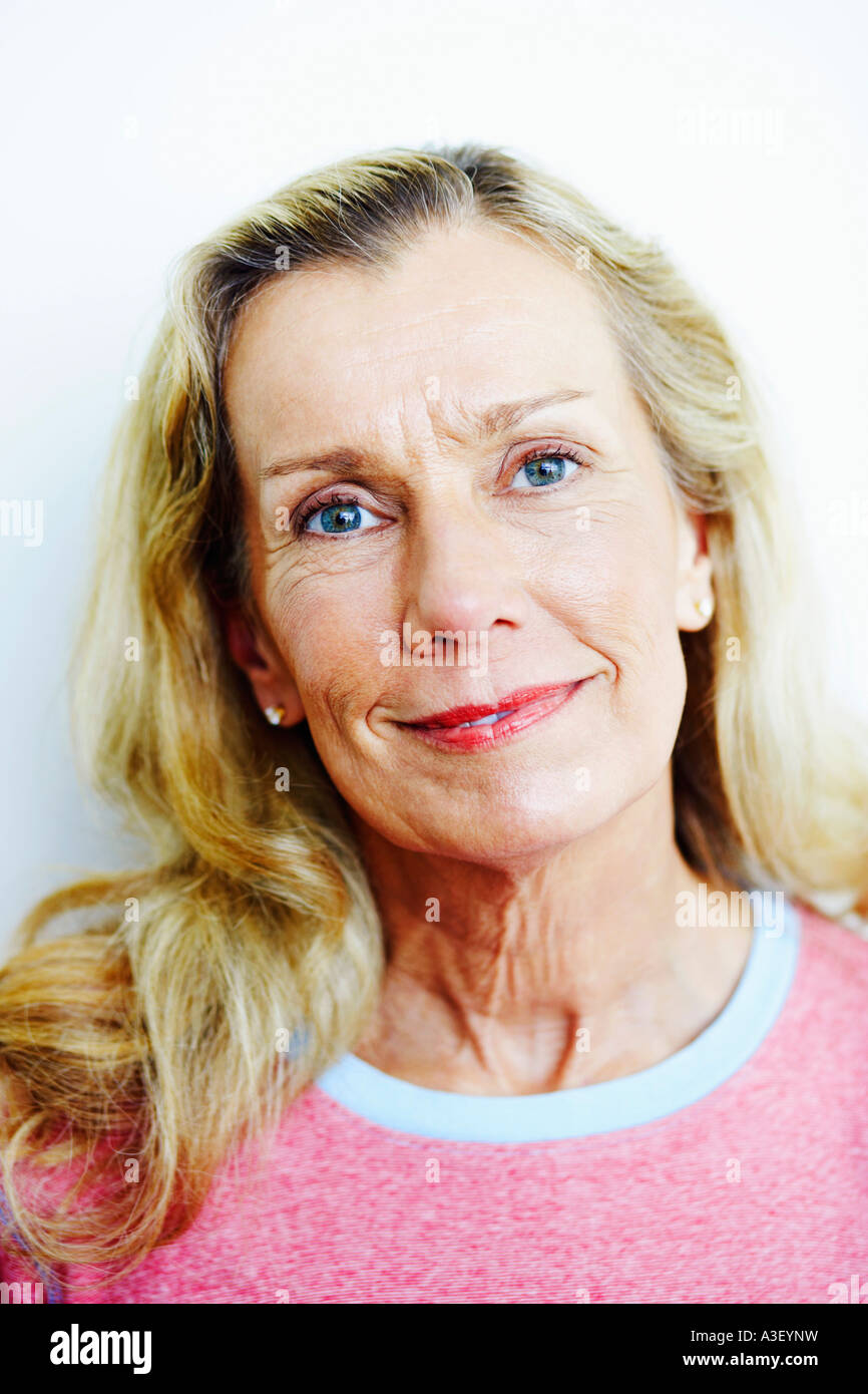 Portrait of a mature woman grinning Stock Photo - Alamy
