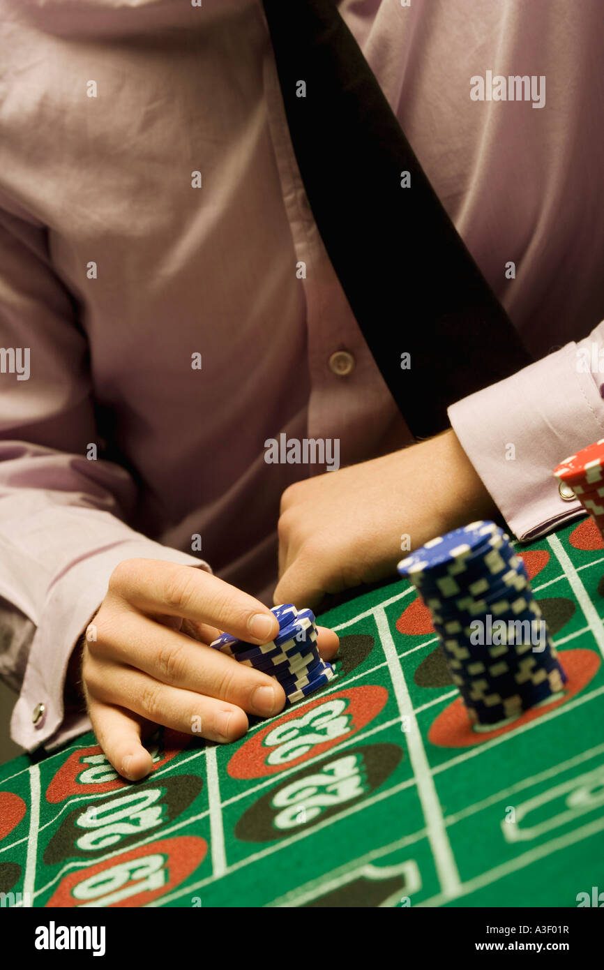 Man playing roulette Stock Photo - Alamy
