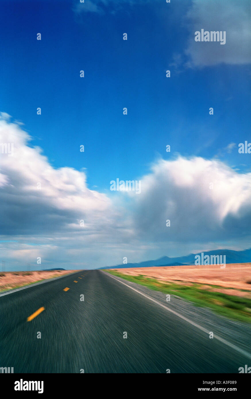 Driving down the road in Nevada Stock Photo - Alamy