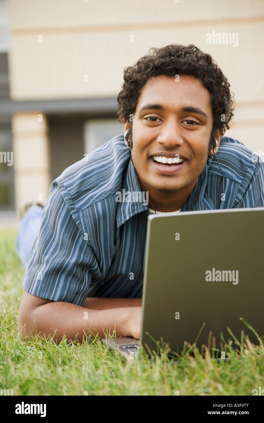 Man working laptop typing outdoors hi-res stock photography and images ...