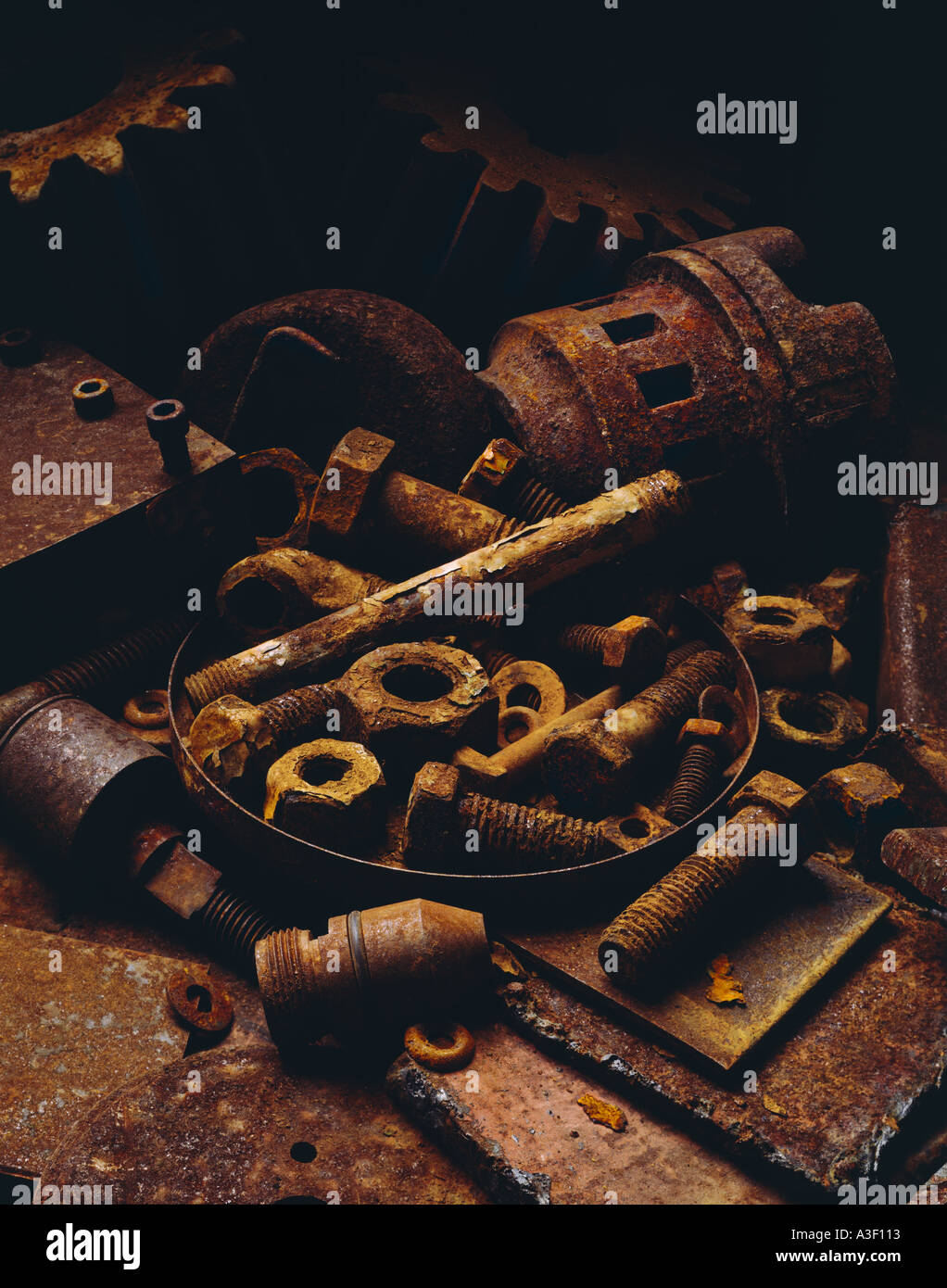 Metal Rusted steel parts and rusted tools in factory or machine shop ...