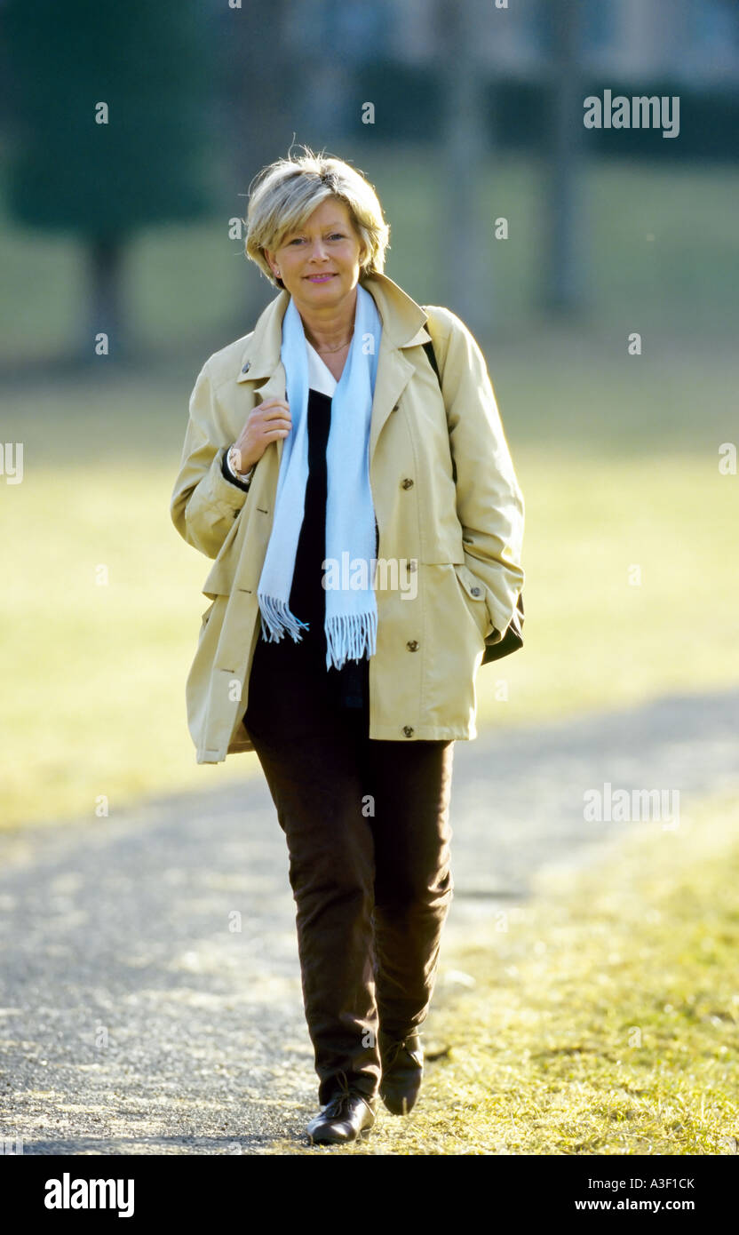 MR MATURE WOMAN STROLLING Stock Photo - Alamy