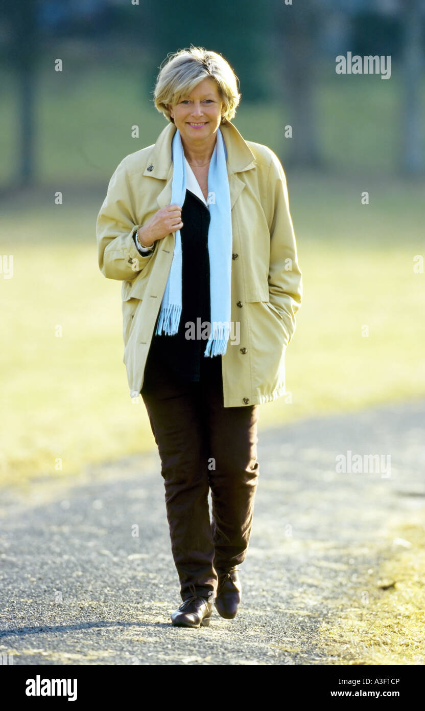 MR MATURE WOMAN STROLLING Stock Photo - Alamy