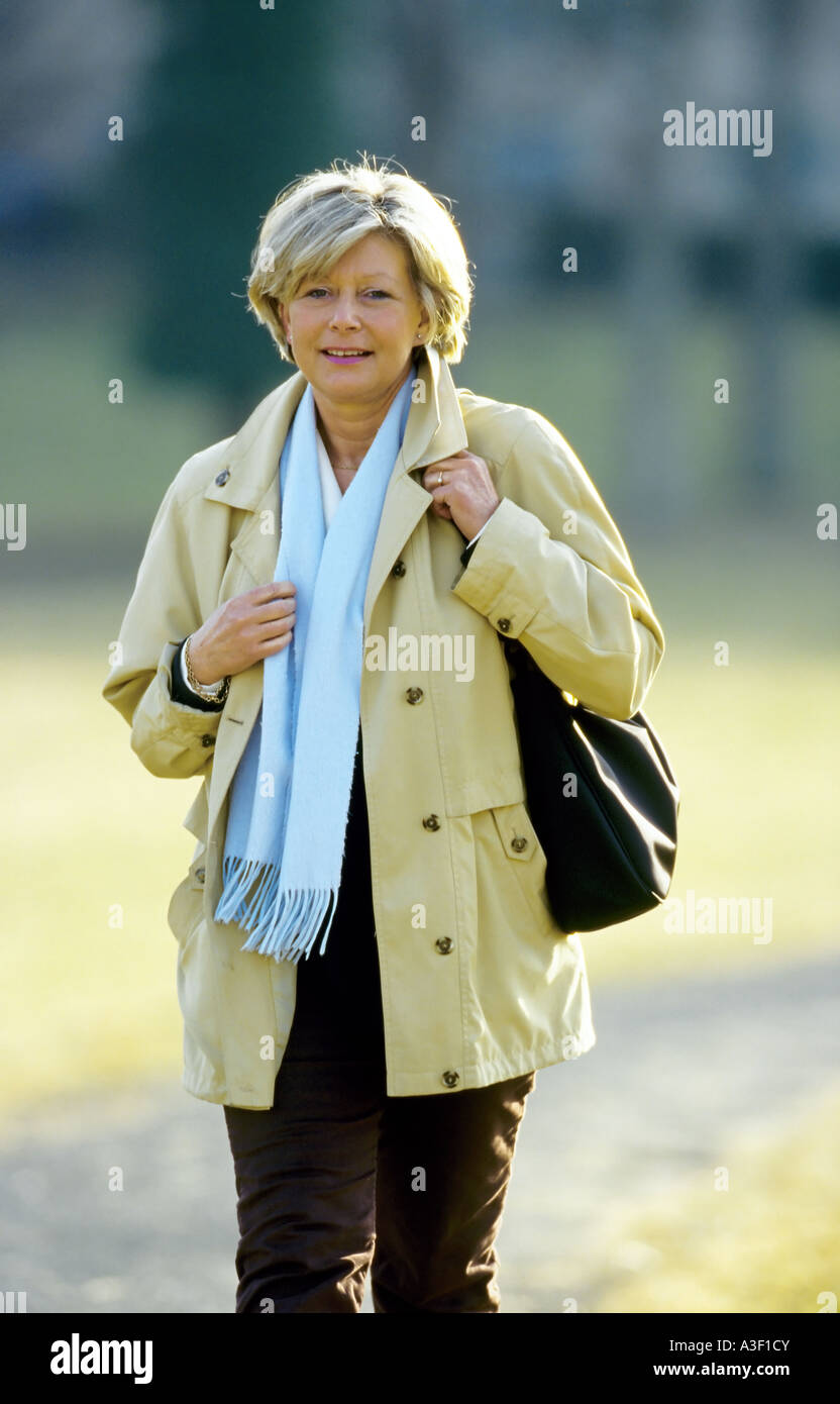 MR MATURE WOMAN STROLLING Stock Photo - Alamy