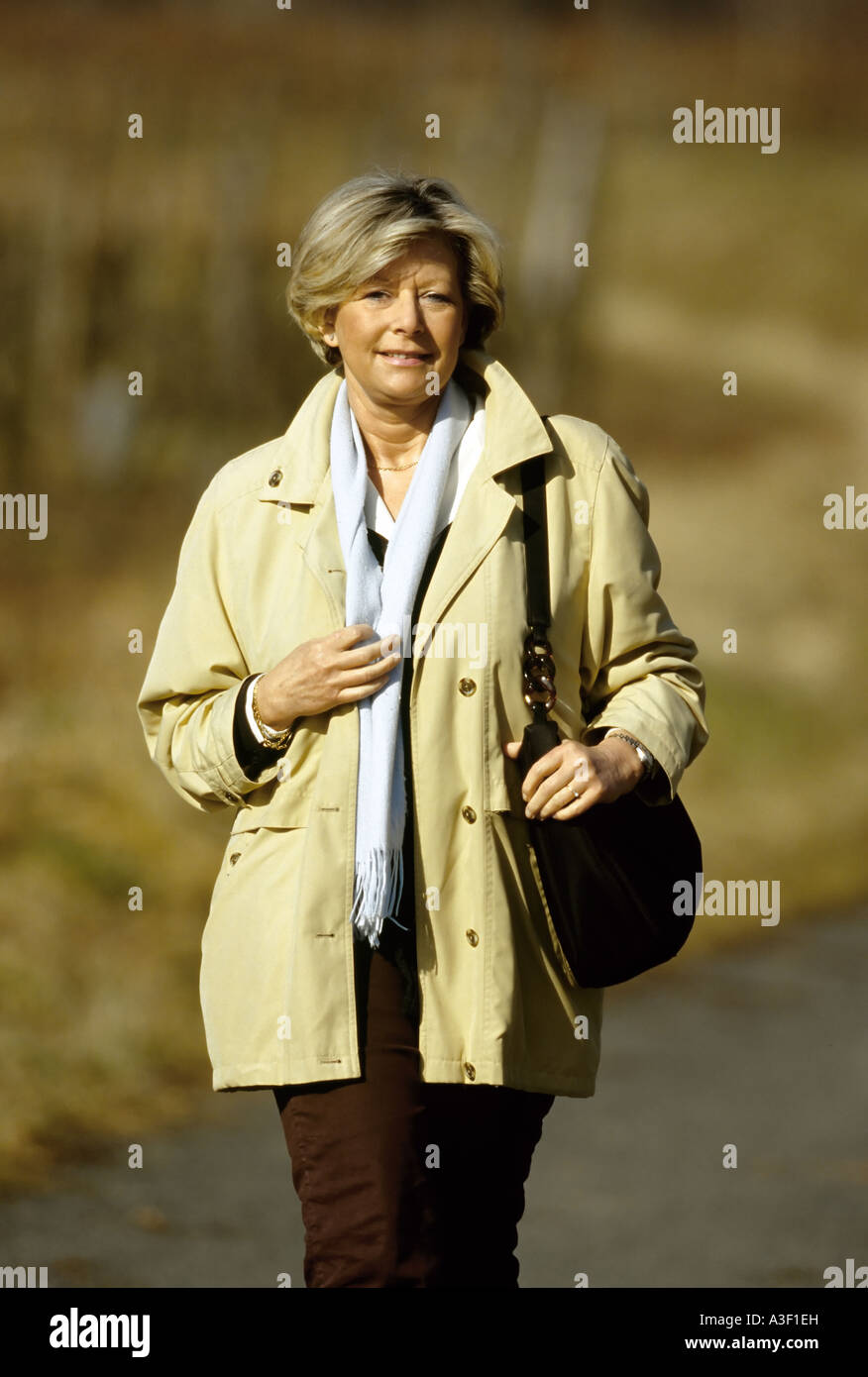 MR MATURE WOMAN STROLLING Stock Photo - Alamy