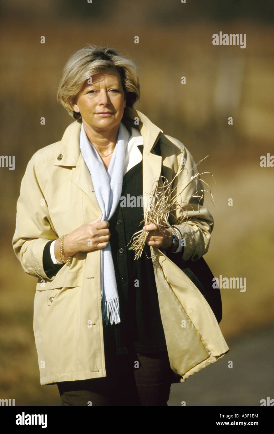 MR MATURE WOMAN STROLLING Stock Photo - Alamy