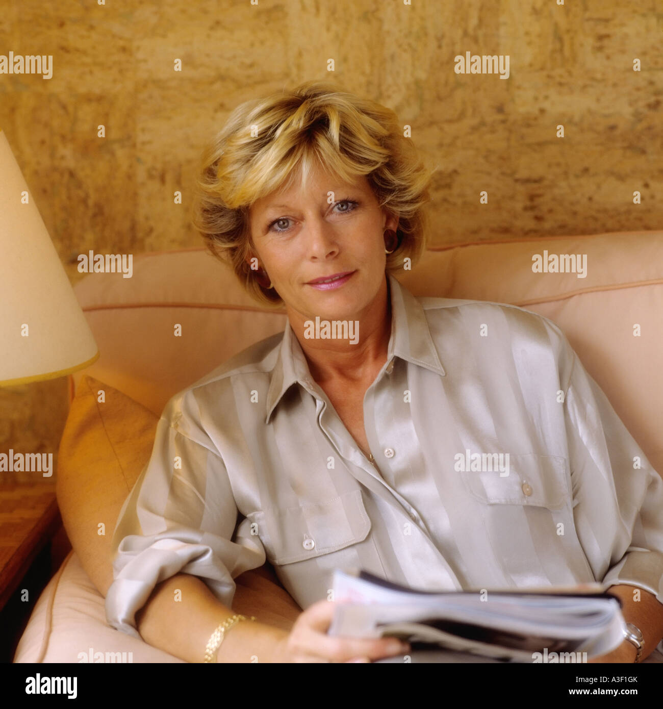 MR MATURE WOMAN'S PORTRAIT ON SOFA Stock Photo - Alamy
