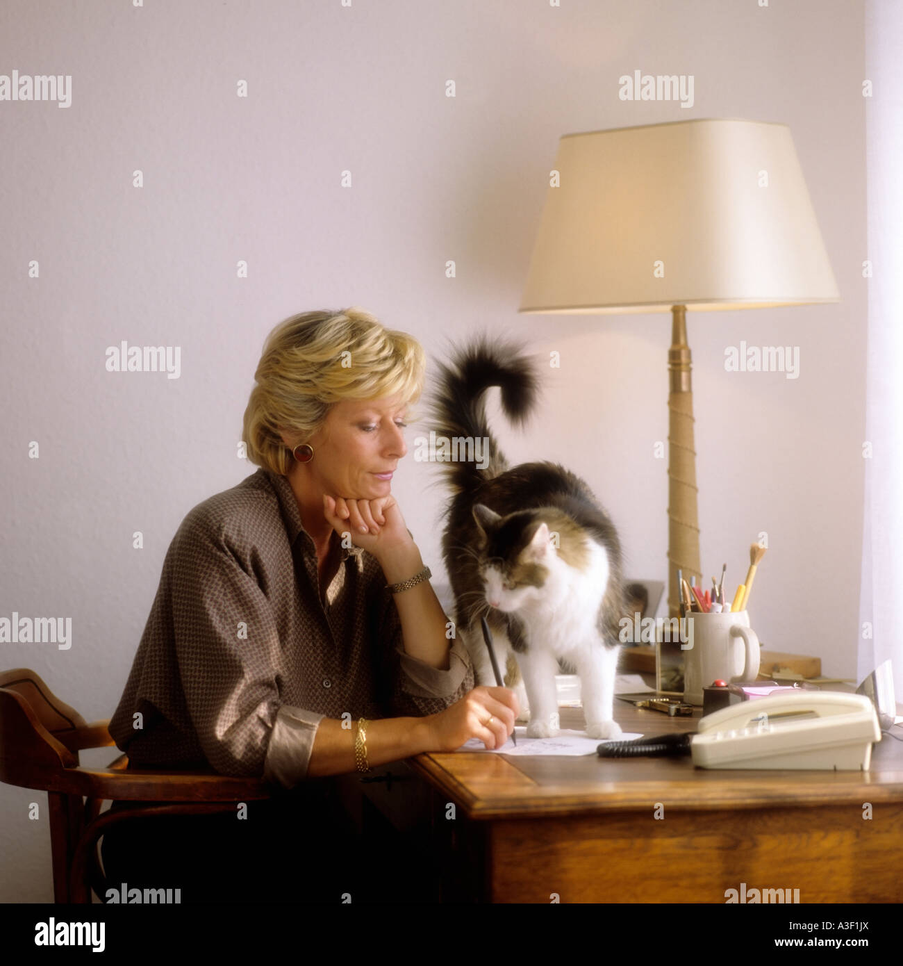 Mature woman write letter hi-res stock photography and images - Alamy