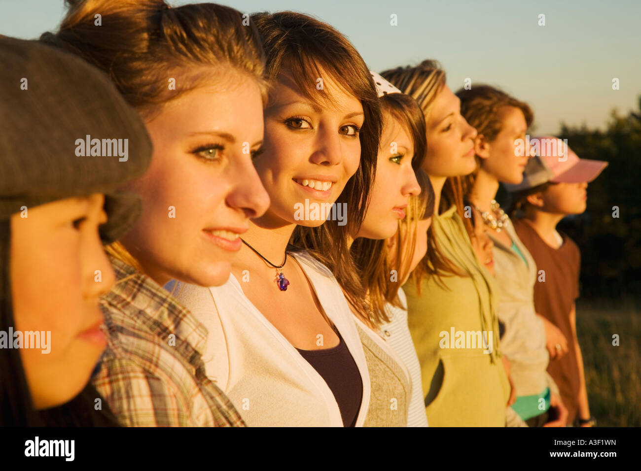 Beautiful women lined up Stock Photo - Alamy
