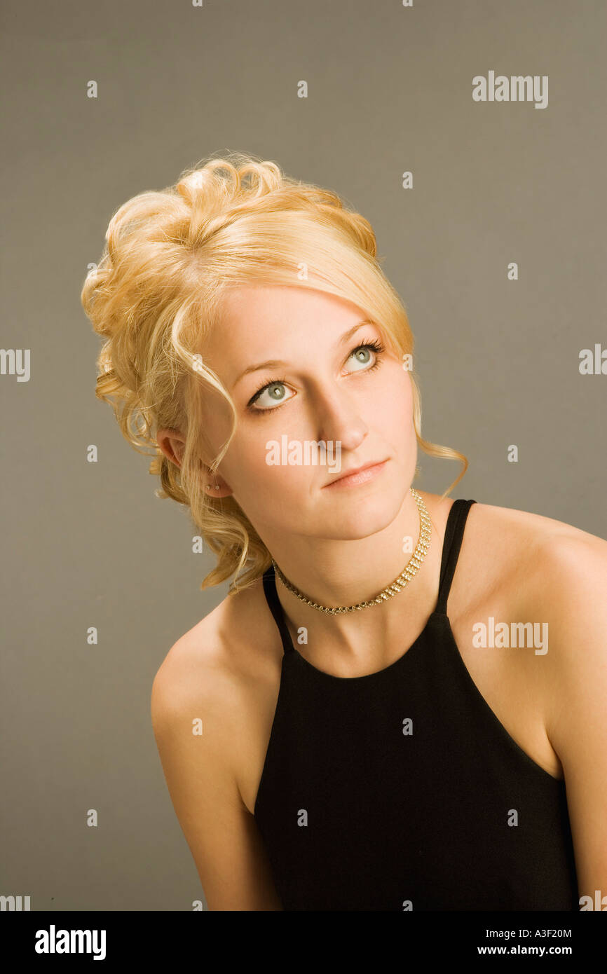 Young woman posing Stock Photo - Alamy