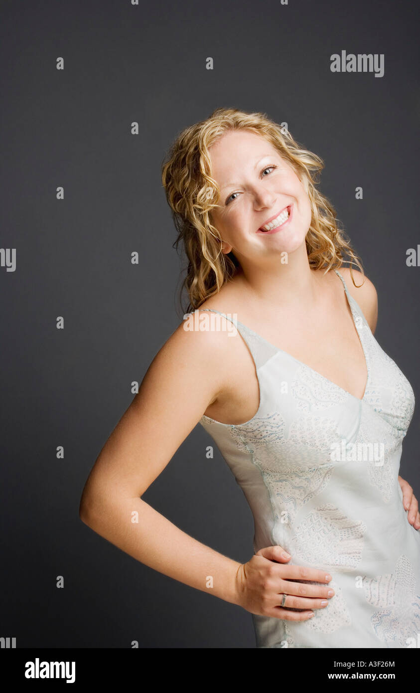 Young woman posing Stock Photo - Alamy