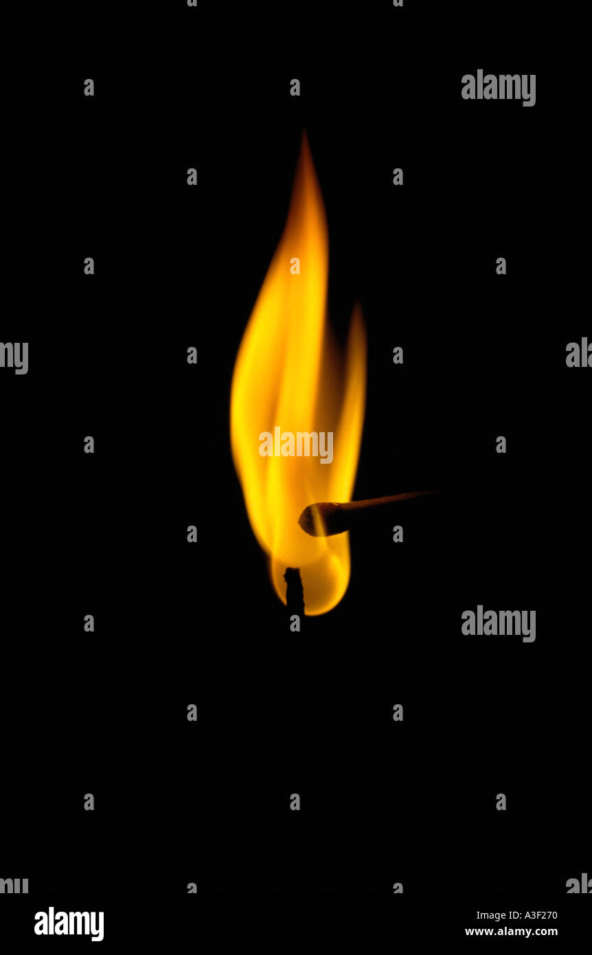 Flame from match and candle Stock Photo - Alamy