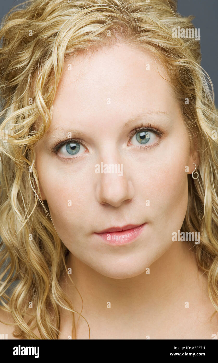Young woman posing Stock Photo - Alamy