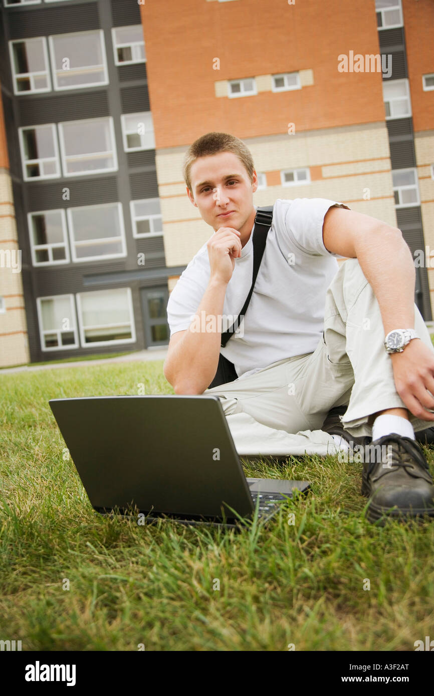 Young man working on computer Stock Photo - Alamy