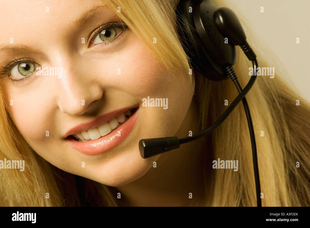 Woman with a head set Stock Photo - Alamy