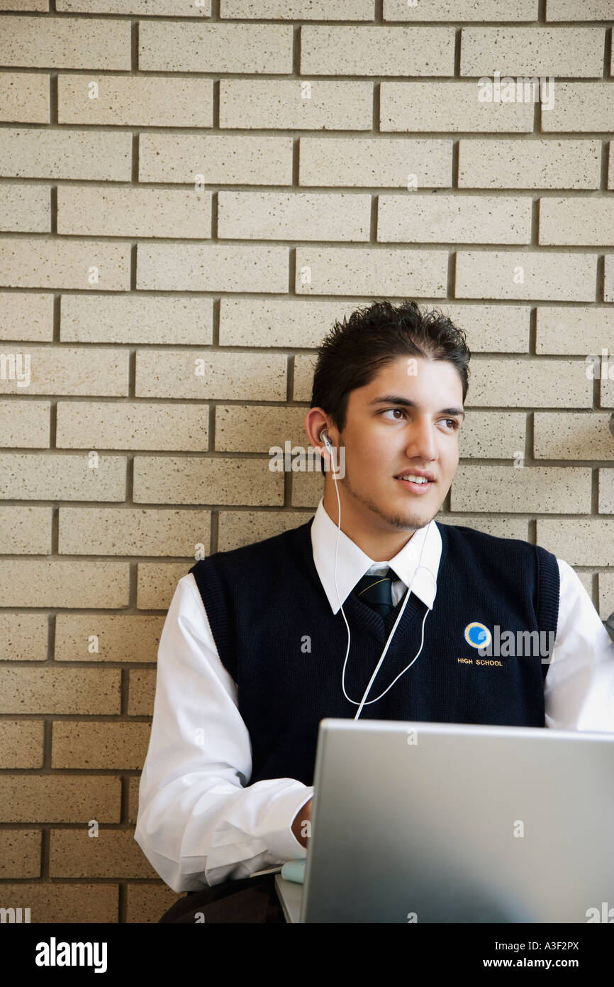 Student working on a laptop Stock Photo - Alamy