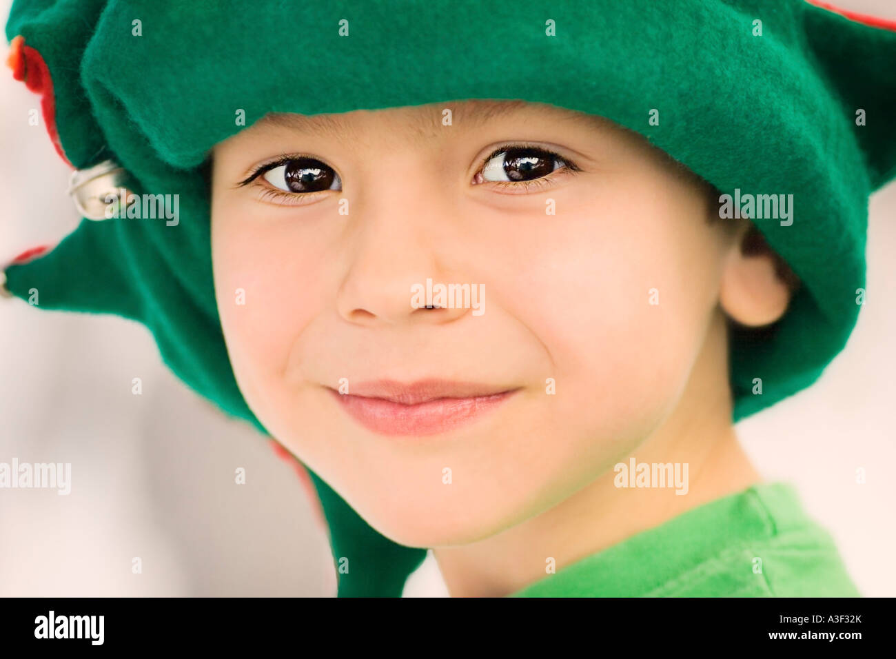 Boy wearing a festive hat Stock Photo - Alamy