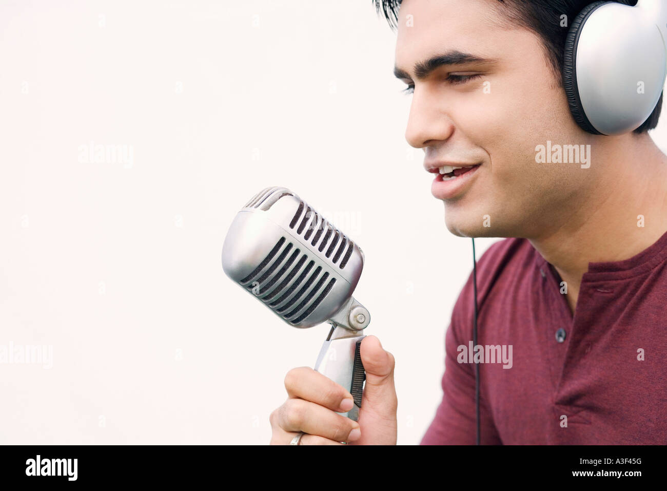 Side profile young man singing hi-res stock photography and images - Alamy