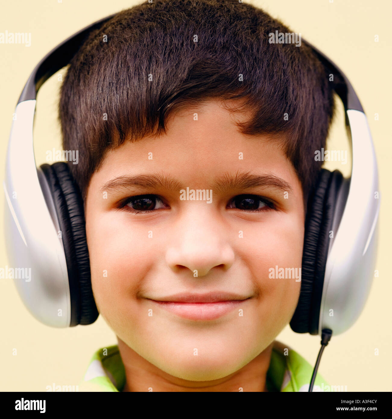 Asian boy wearing headphones hi-res stock photography and images - Alamy