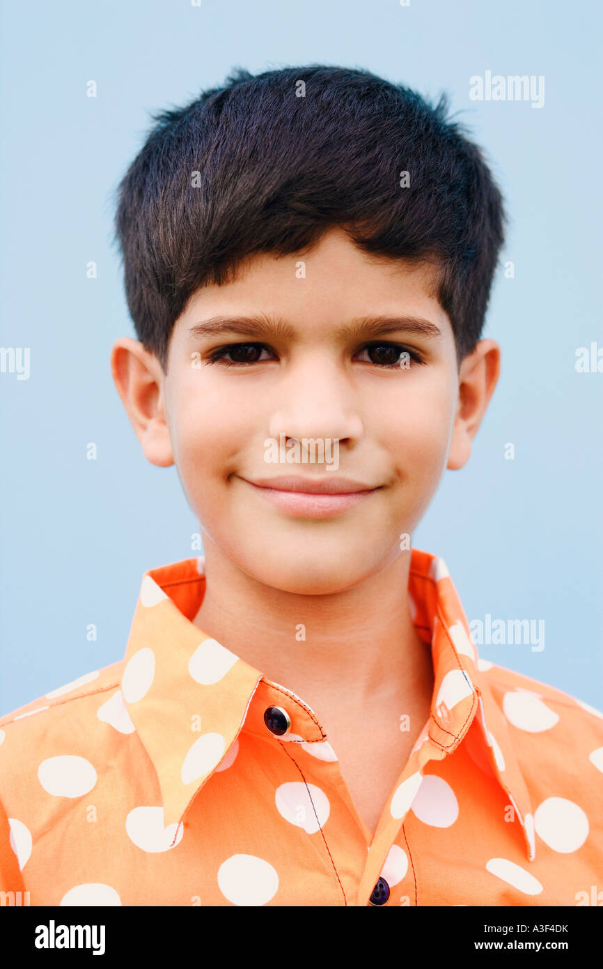 Boy smirking hi-res stock photography and images - Alamy