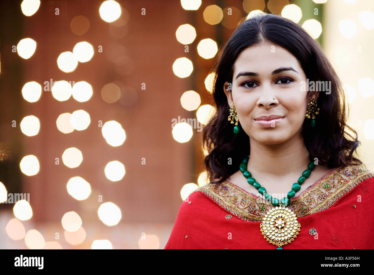 Portrait of a young woman grinning Stock Photo - Alamy