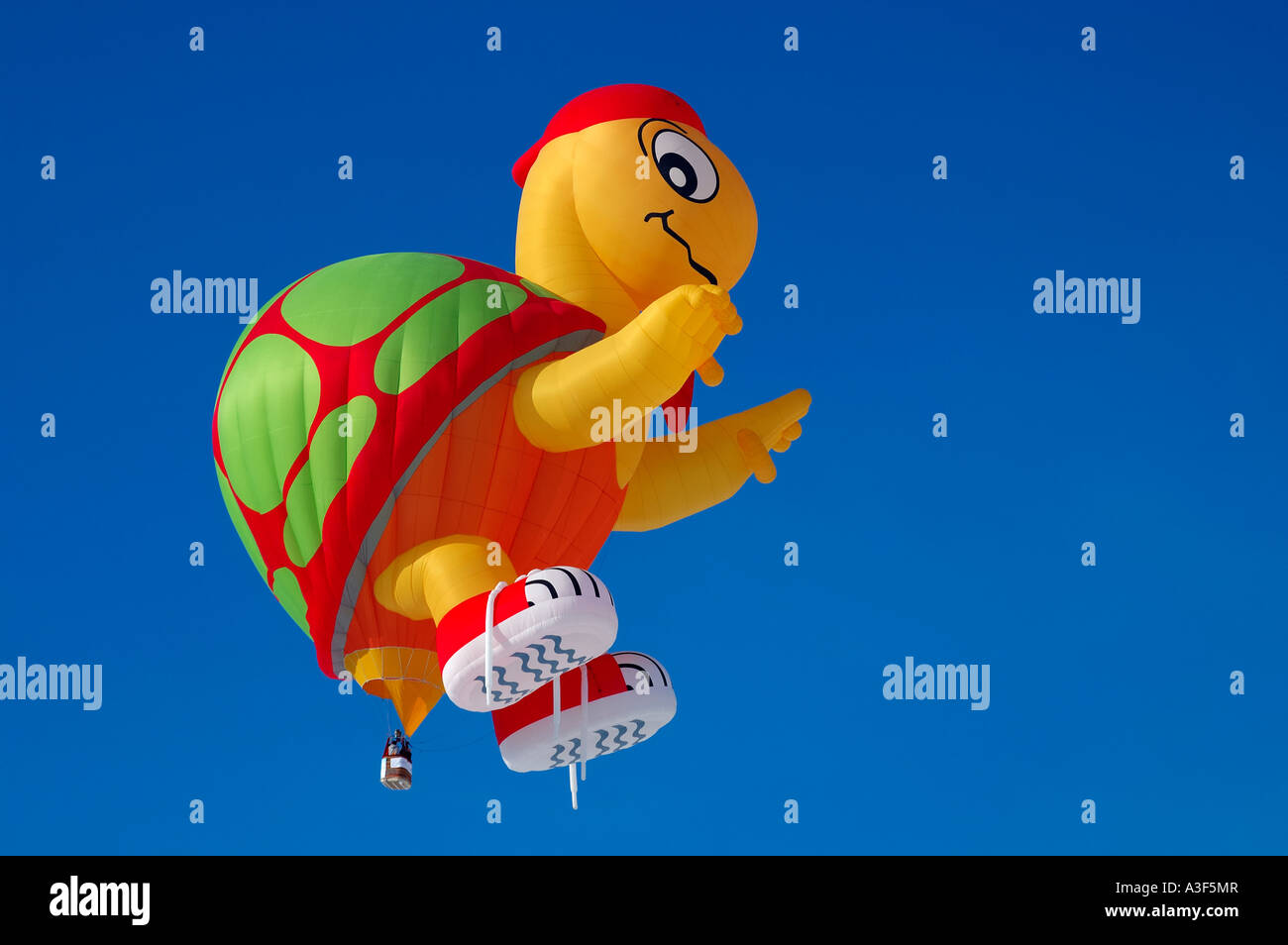 A hot air balloon in the shape of a tortoise or turtle, at the Chateau ...