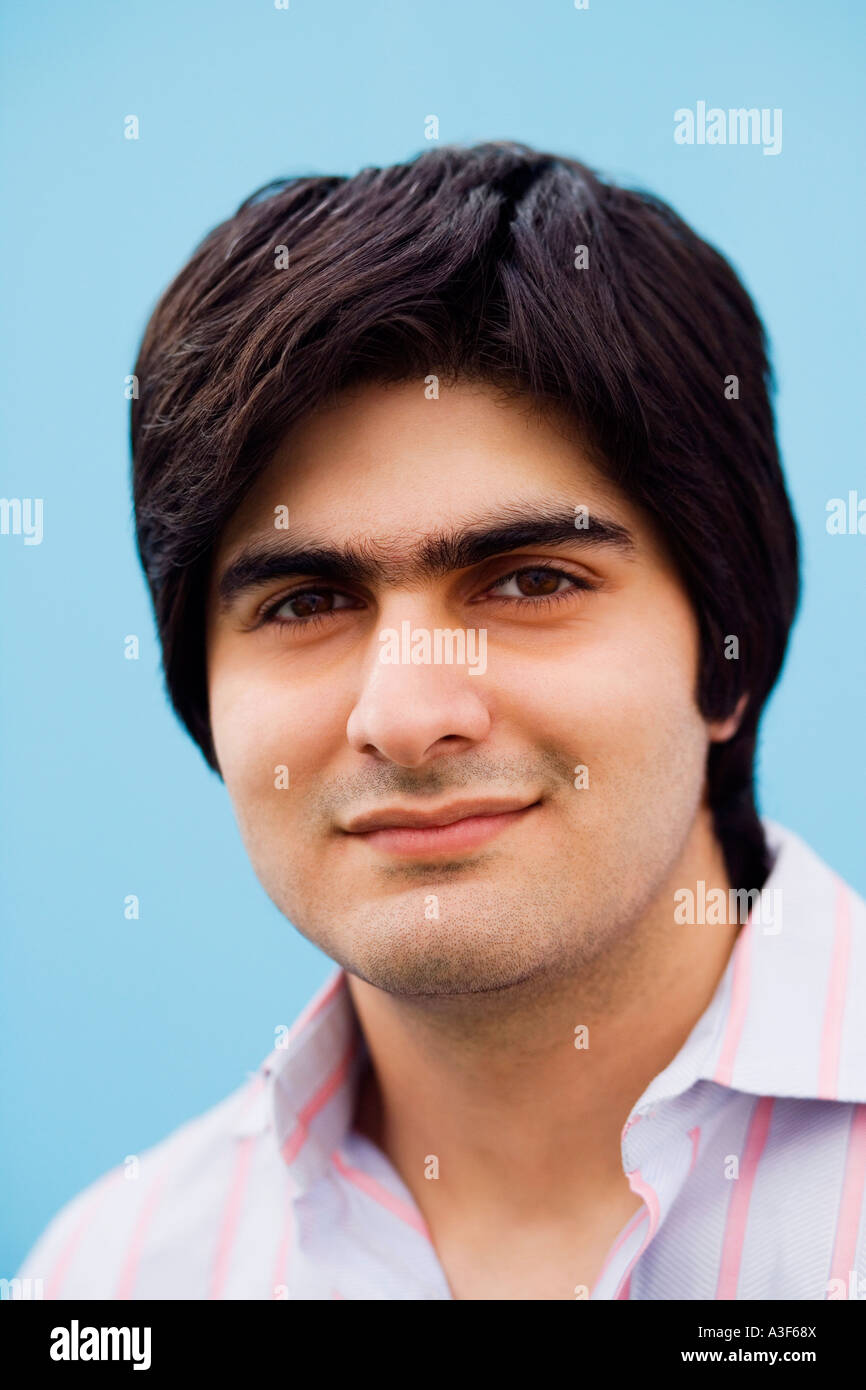Portrait of a young man smiling Stock Photo - Alamy