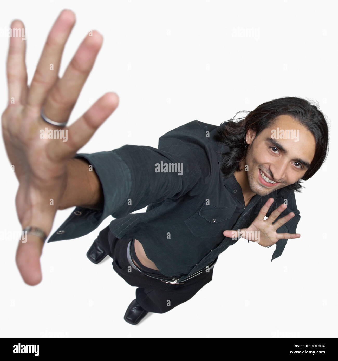 High angle view of a young man gesturing Stock Photo - Alamy
