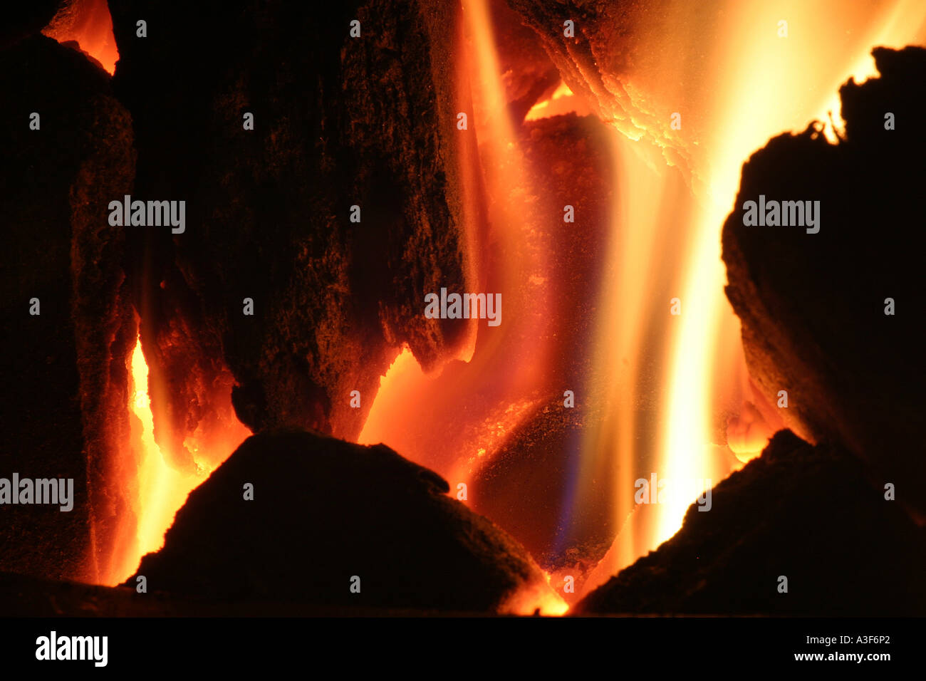 Flames in a coal fire Stock Photo - Alamy