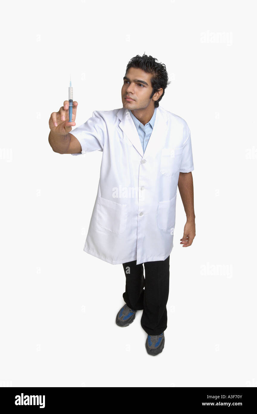 Indian doctor injection Cut Out Stock Images & Pictures - Alamy