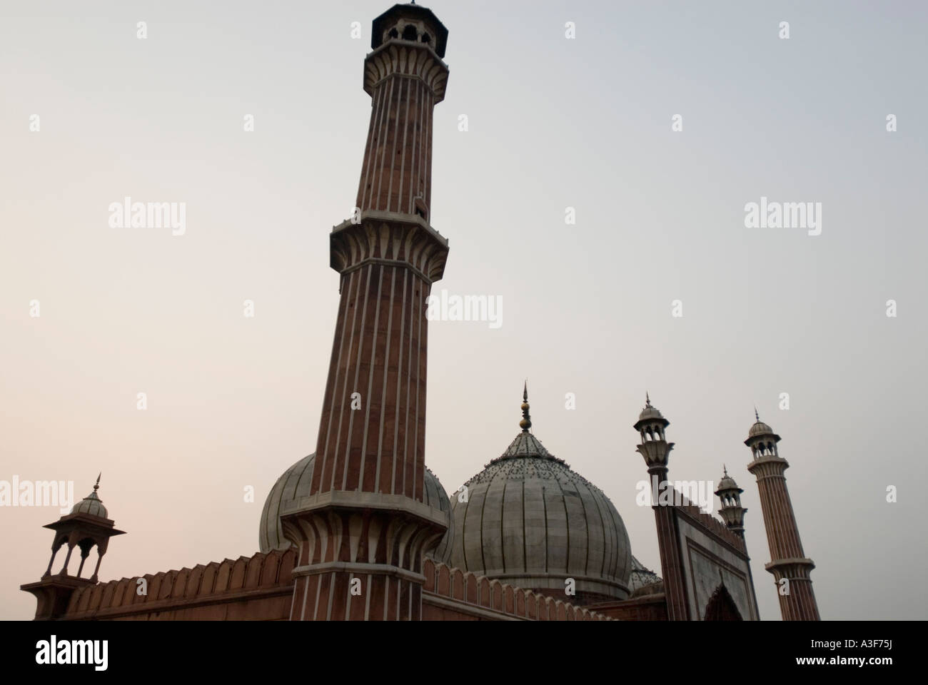 Low angle view of a dome and minarets of a mosque, Jama Masjid, New ...