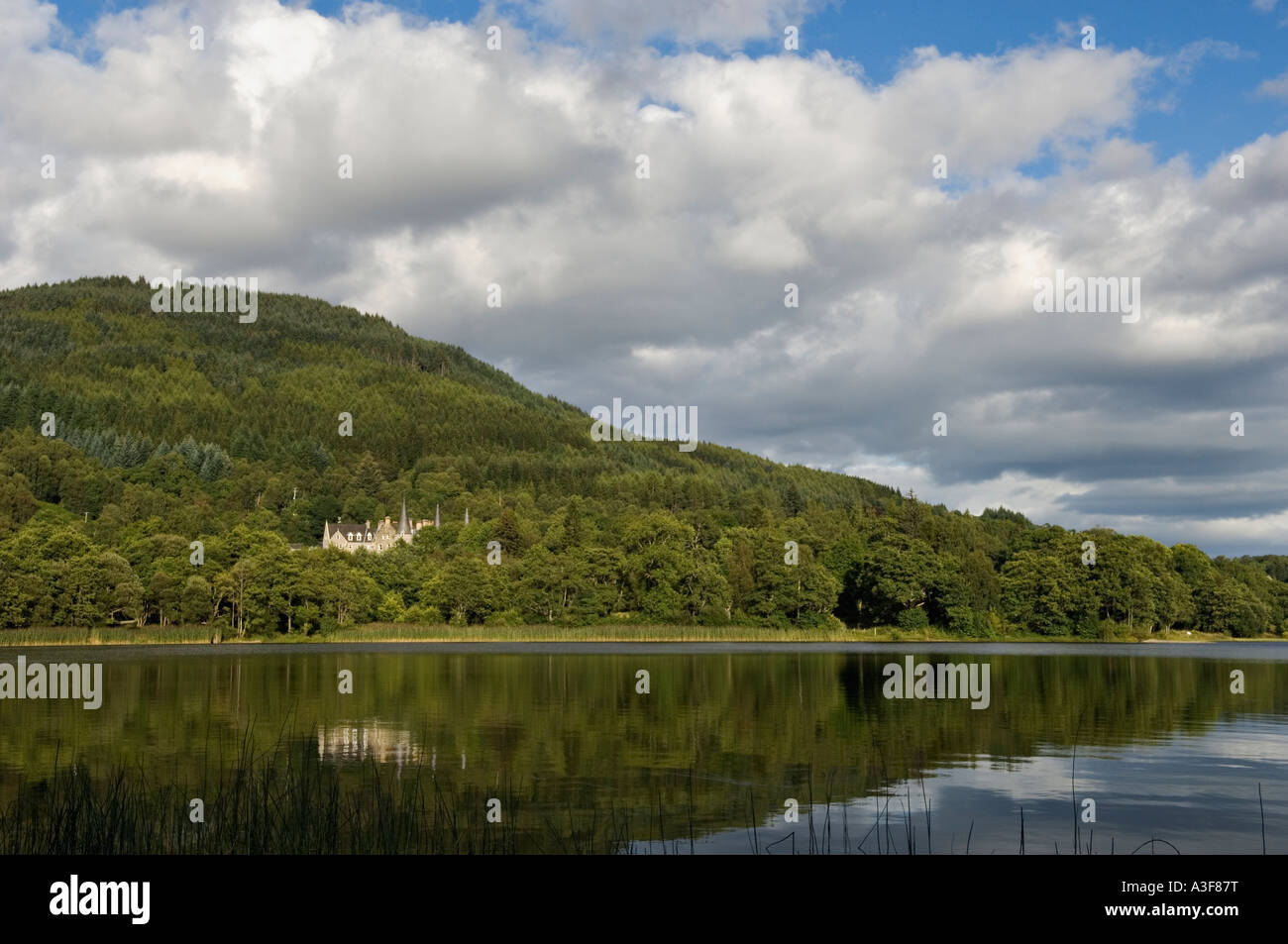 Tigh Mor and its Reflection on Loch Achray Queen Elizabeth Forest Park ...