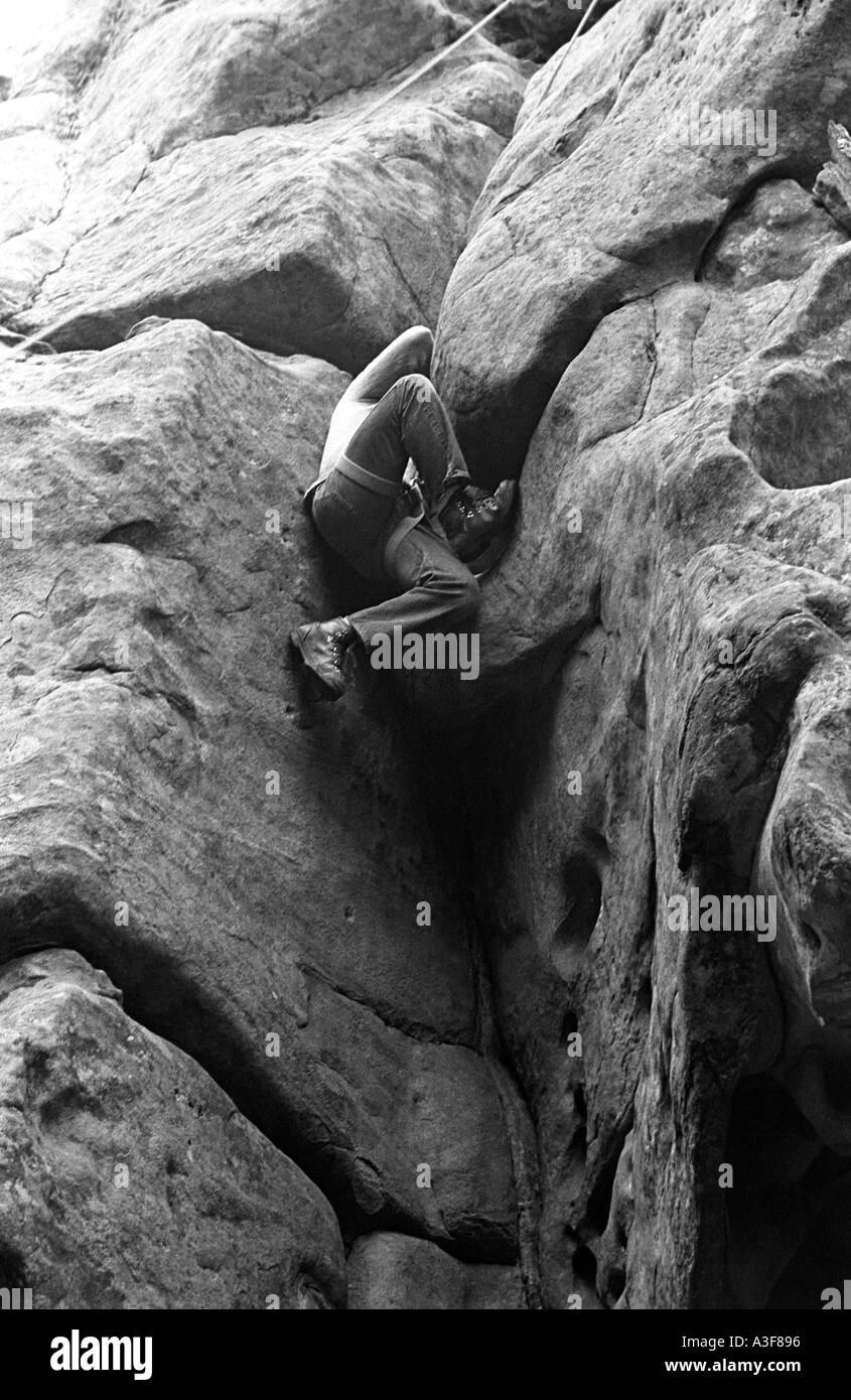 Rock climber scale face of rock Stock Photo - Alamy