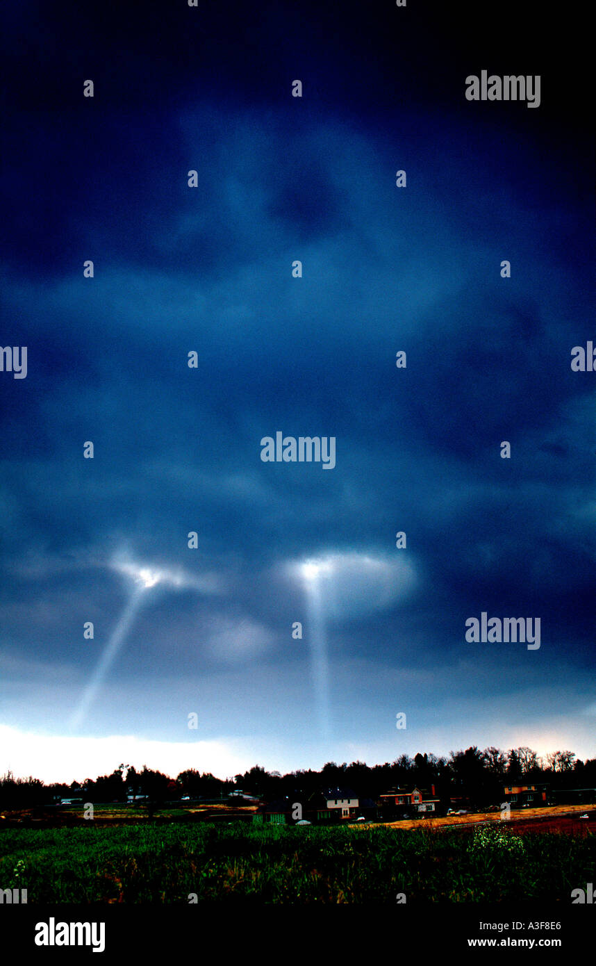 Sun rays break through clouds to form a menacing face Stock Photo - Alamy