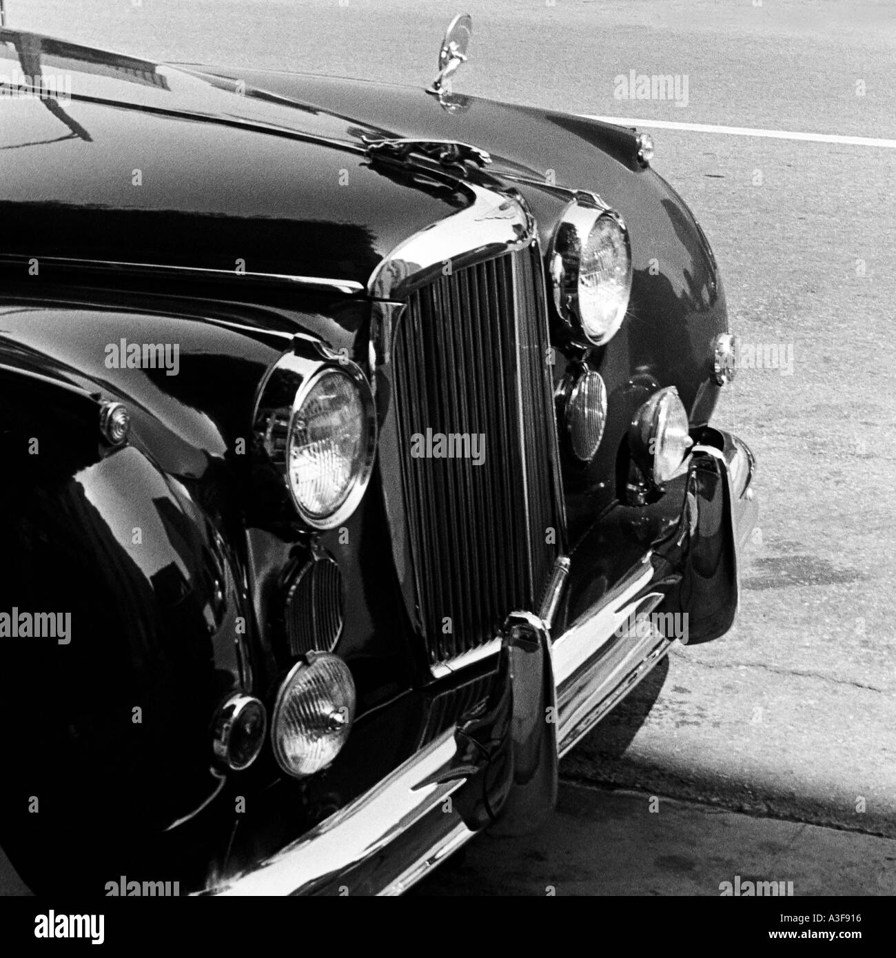 Sparkling front end of well kept fancy old black car Stock Photo - Alamy