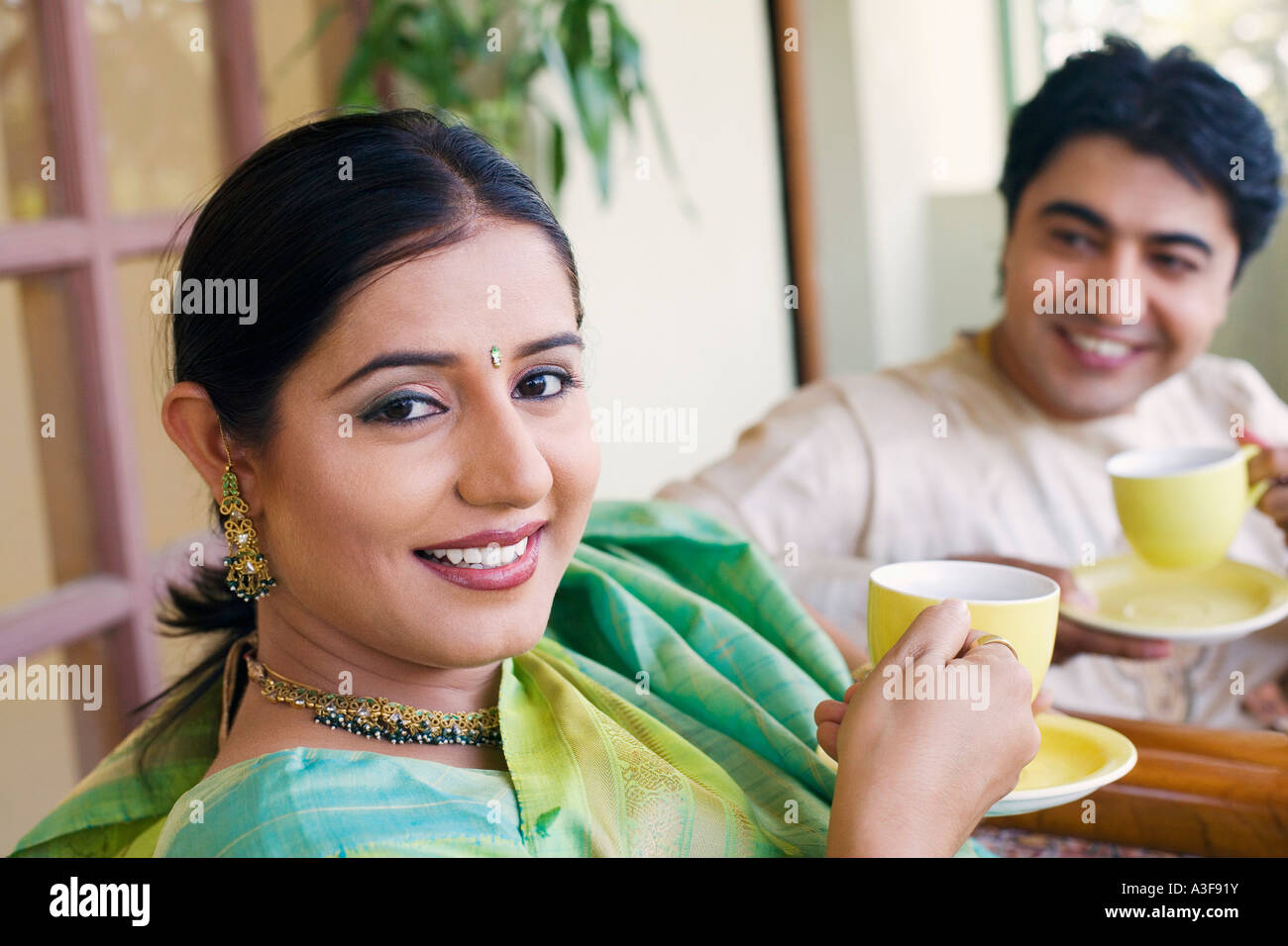 Excited couple tea cups hi-res stock photography and images - Alamy