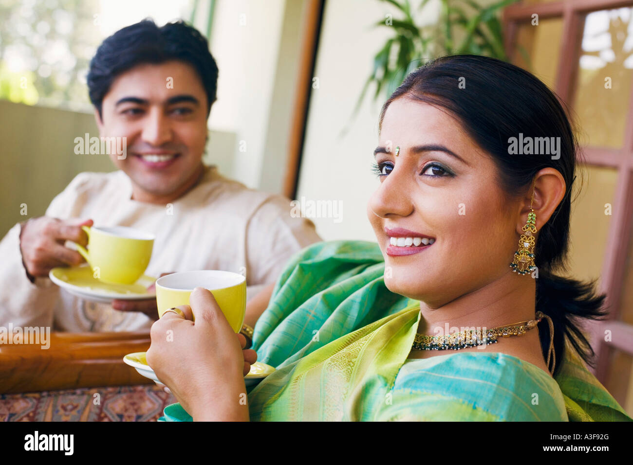 Excited couple tea cups hi-res stock photography and images - Alamy